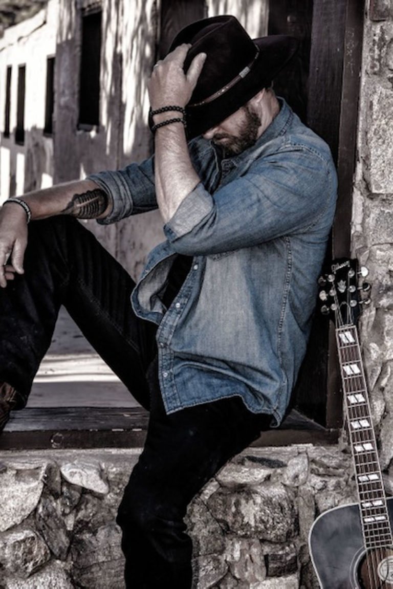 Country music artist, Rob West, trades his golf clubs for a guitar ...